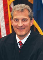 Zahra takes thumbs off scale of justice and lets laws lead - Michigan ...